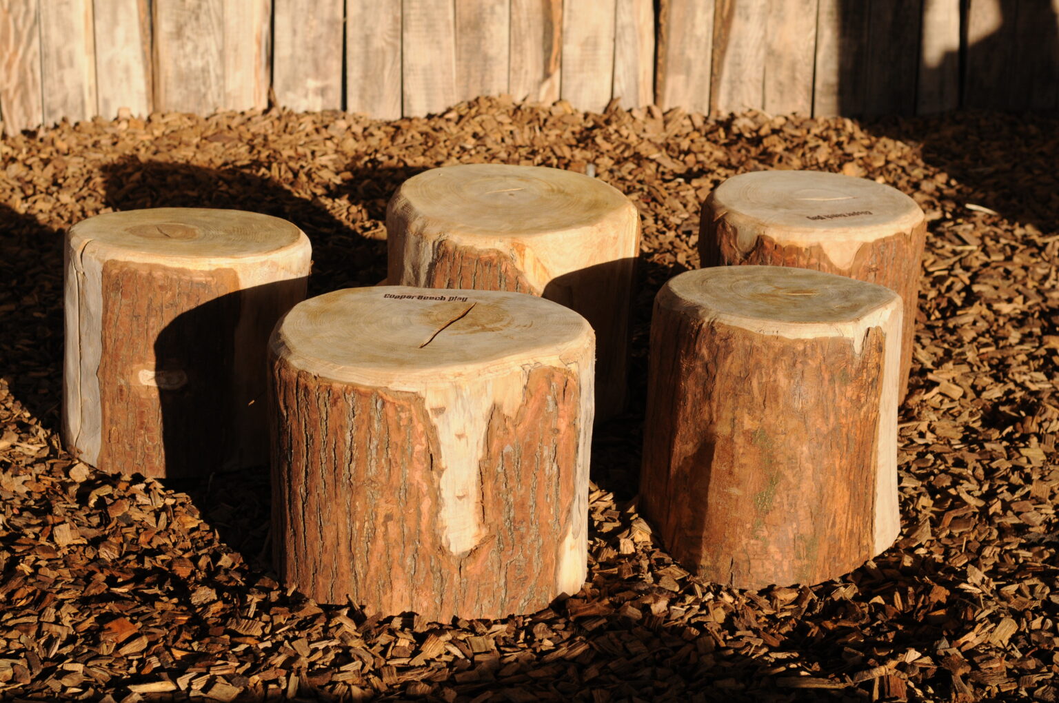 Log Seats | Wooden Play Equipment | Copper Beech Play